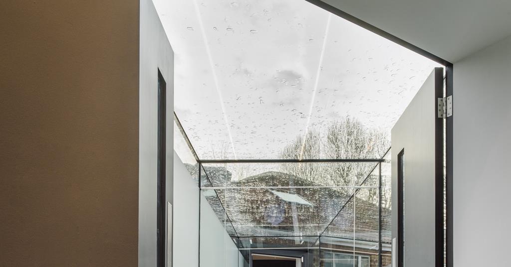 Paul Vick Architects completes 15m-long glass bridge for global ...