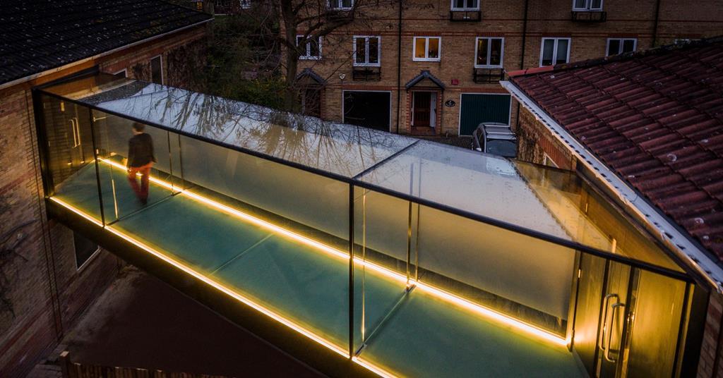 Paul Vick Architects completes 15m-long glass bridge for global ...