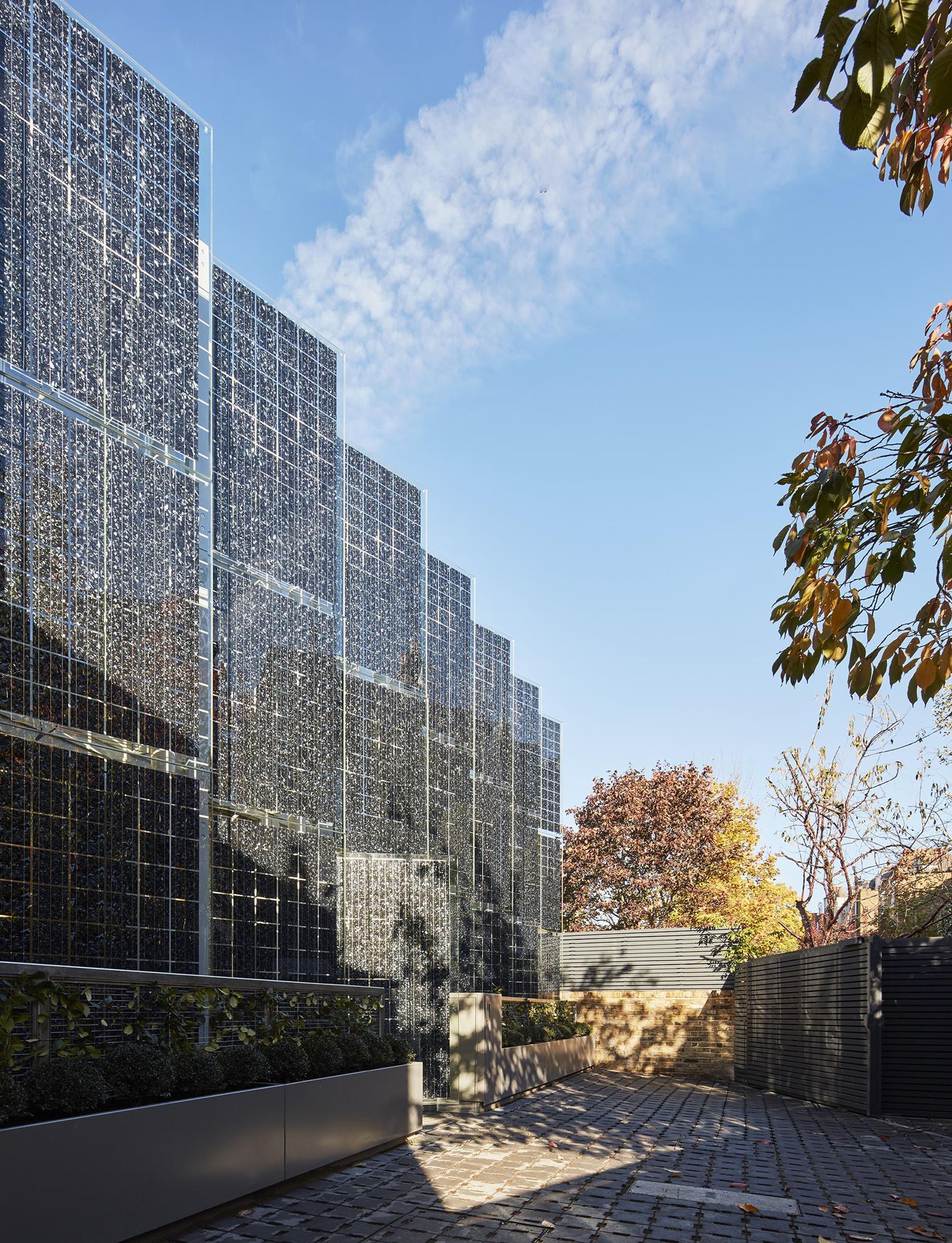 Horden Cherry Lee completes houses with electricity-generating facades ...